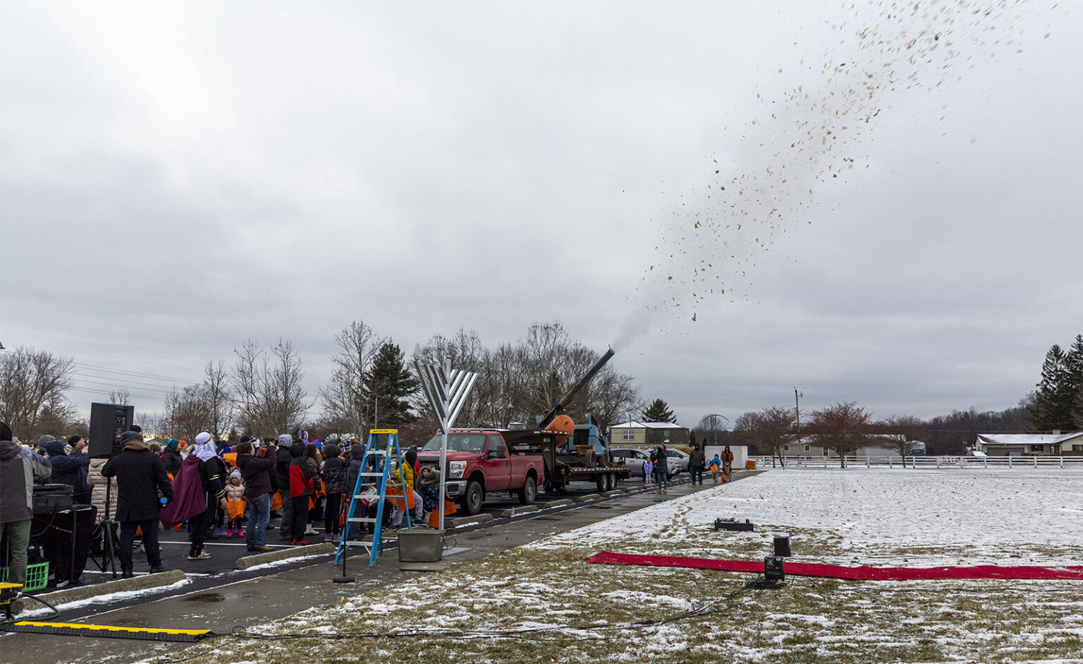 Giant menorahs, helicopters, candy cannons announce the arrival of Hanukkah