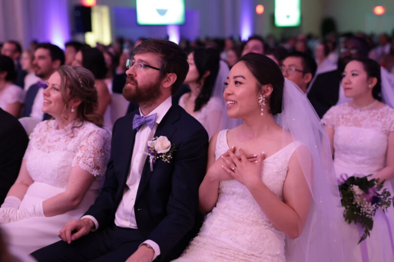 8,000 couples marry in 'Unification Church' Holy Marriage Blessing Ceremony