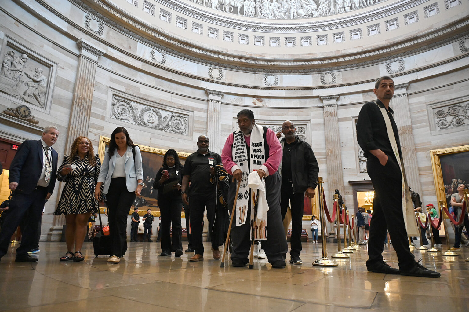 Rev. William Barber arrested in Capitol Rotunda after praying against ...