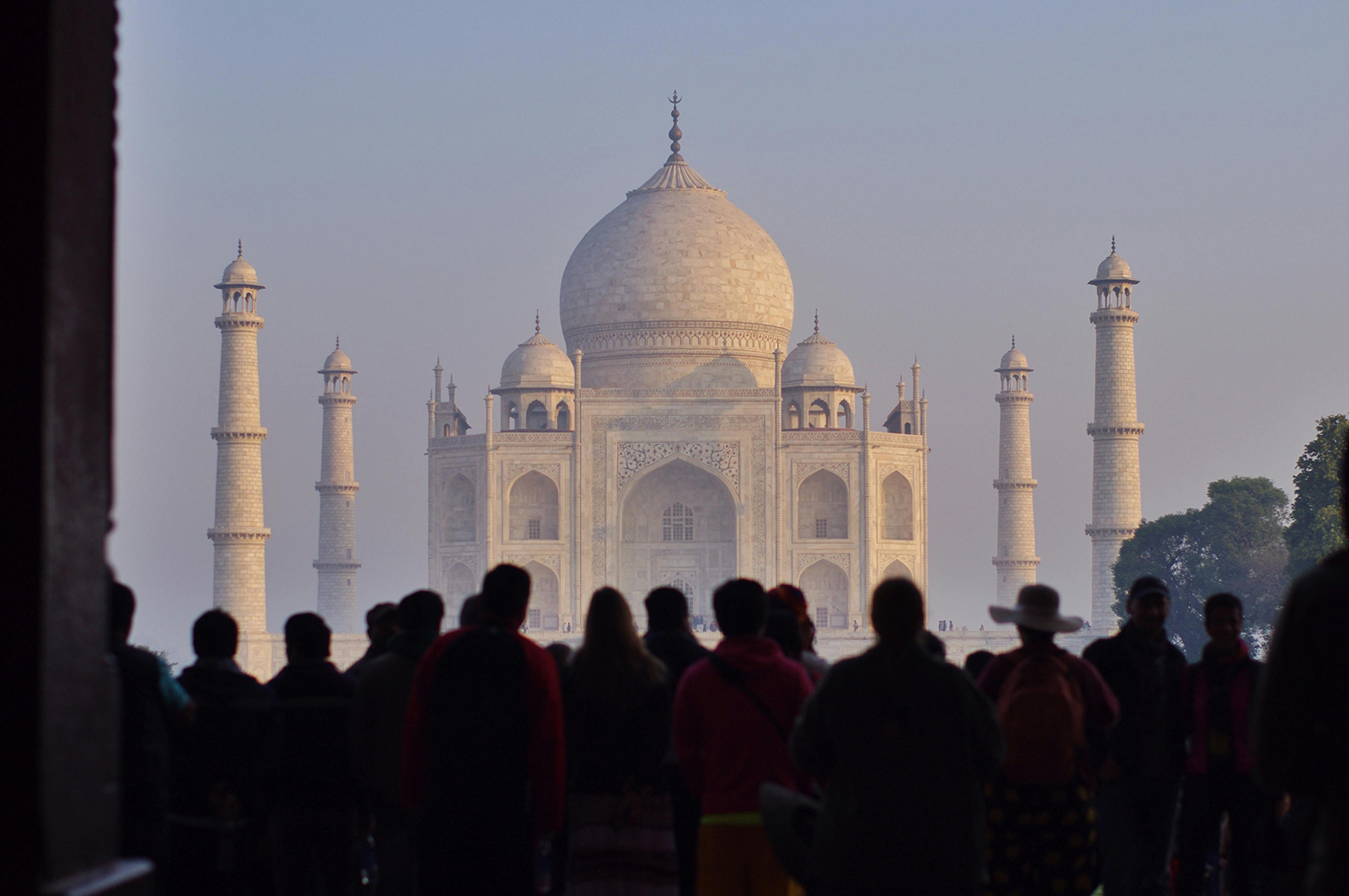 How does India's Sadhan village continue to resist religious polarization?