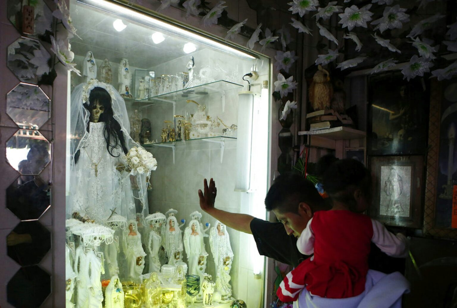 ‘Only death can protect us’: How the folk saint La Santa Muerte ...